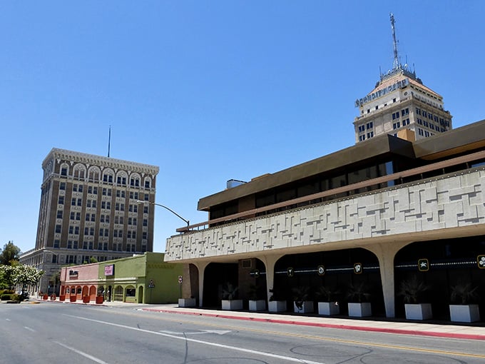 Downtown Fresno's architectural treasures frame a perfect California sky, showcasing the blend of historic grandeur and modern accessibility that defines this affordable urban gem.
