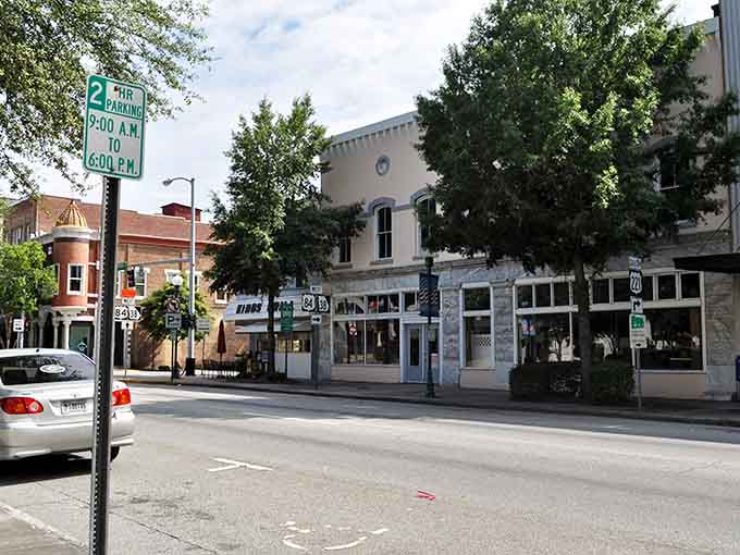 A slice of small-town America where two-hour parking signs remind you to slow down and savor downtown Valdosta's charming storefronts and tree-lined streets.