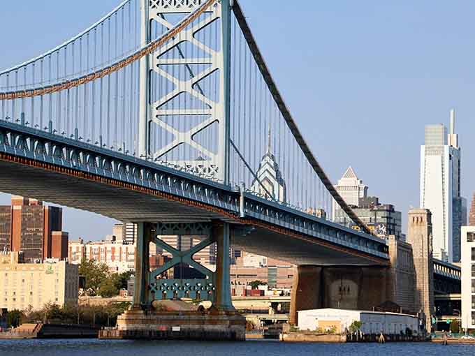 The majestic Ben Franklin Bridge connects Camden to Philadelphia, offering seniors an affordable gateway to big-city amenities while maintaining small-town living costs.