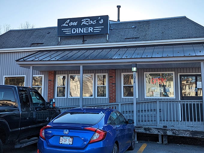 The unassuming exterior of Lou Roc's Diner stands like a breakfast beacon in Worcester, promising morning salvation to the hungry masses.