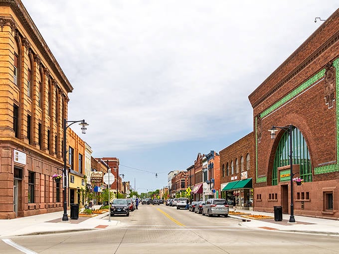 Broadway Street stretches before you like a Norman Rockwell painting come to life, where historic brick buildings house modern dreams and small-town possibilities.