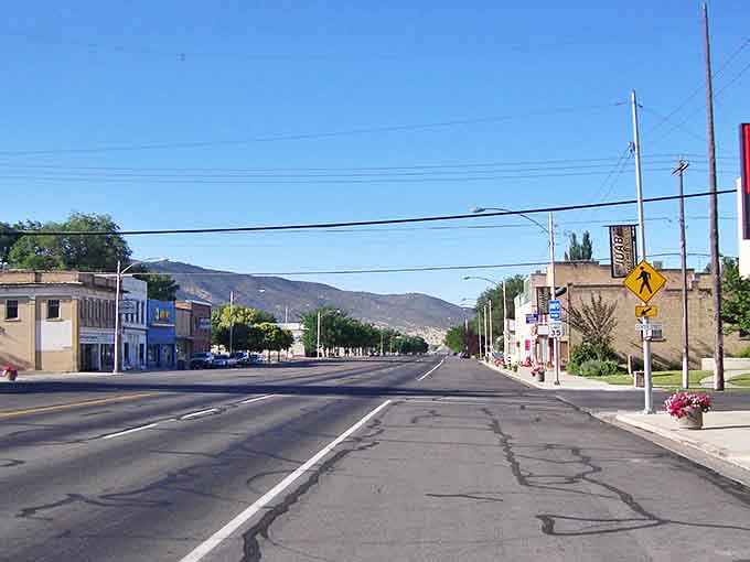 Welcome to Nephi, where the mountains stand guard and nobody honks unless a deer is contemplating jaywalking.