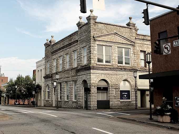 Historic stone building stands proudly on Martinsville's corner, showcasing the town's architectural heritage with elegant details and character.