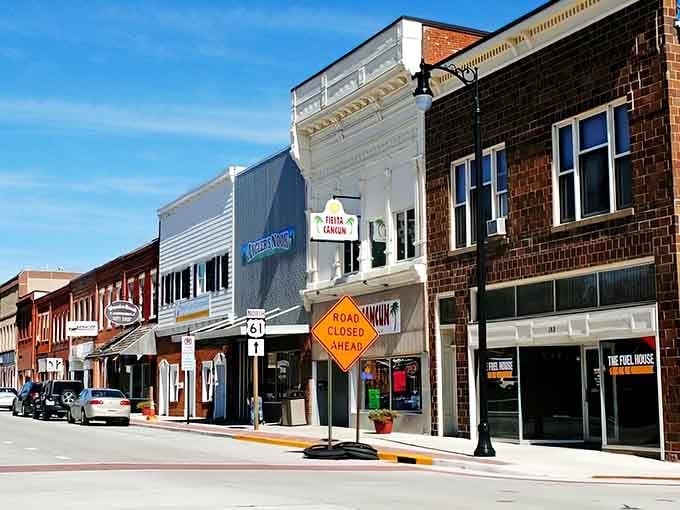 Classic brick storefronts line Main Street where your rent money actually leaves room for living expenses too.