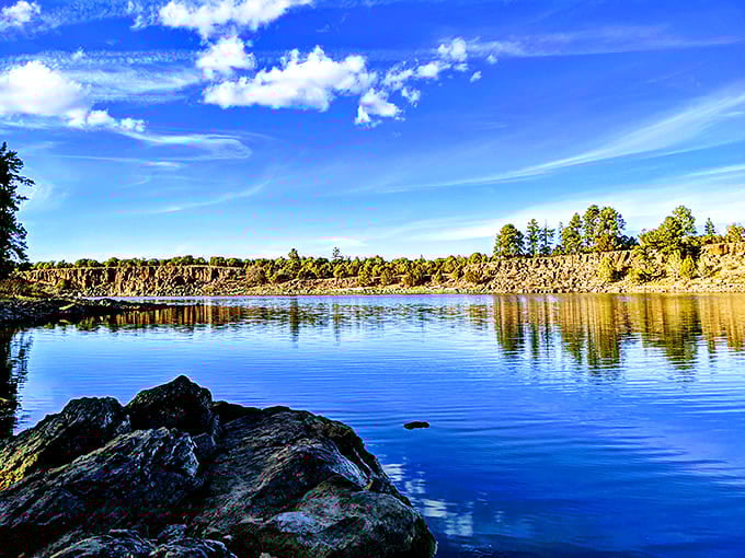 Mirror, mirror on the lake! The perfect stillness creates nature's most flawless reflection, making you question which way is up.