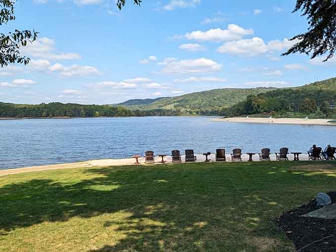 Adirondack chairs lined up like eager spectators at nature's greatest show &ndash; the daily sunset performance over Lake Habeeb.