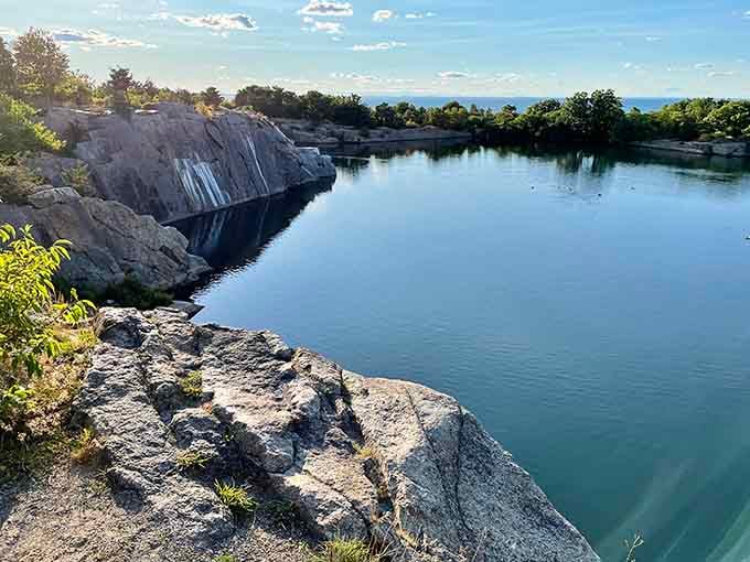 Another angle of the quarry reveals its vastness&mdash;60 feet deep of impossibly clear water surrounded by granite that's older than dinosaurs.