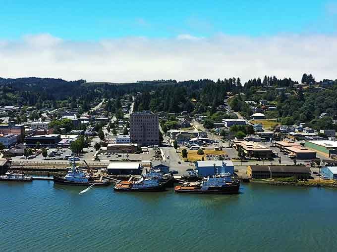 From above, Downtown Coos Bay showcases its authentic charm, with local shops lining streets that still honor their working-class roots.