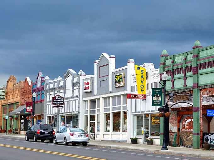 Main Street's colorful facades showcase small-town pride, where every building tells a story and parking is always free.