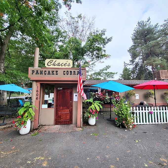 The outdoor patio with its cheerful umbrellas proves that even rainy Washington mornings can't dampen the breakfast spirit here.