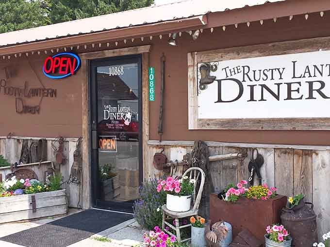Flower boxes bursting with color frame the entrance, like nature's own welcome committee inviting you into this unassuming culinary gem.