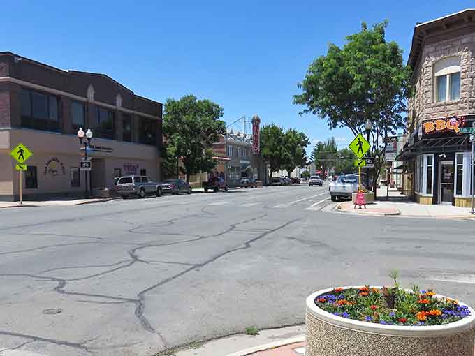 Downtown flower planters add cheerful color to streets where parking is free and stress levels are refreshingly low.