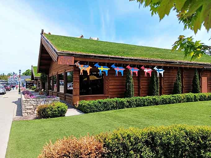 Those colorful wooden goats perched along the roofline aren't just decoration—they're announcing what awaits inside this Scandinavian treasure.