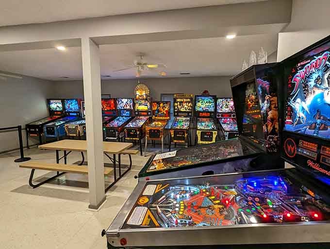 Rows of glowing pinball machines stretch before you like a neon-lit promise of pure, unadulterated fun.