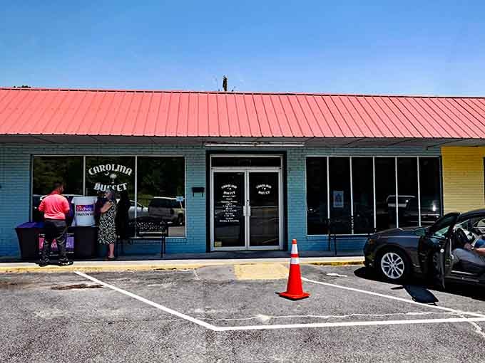 That cheerful blue exterior with the red roof is your beacon to buffet bliss in West Columbia.