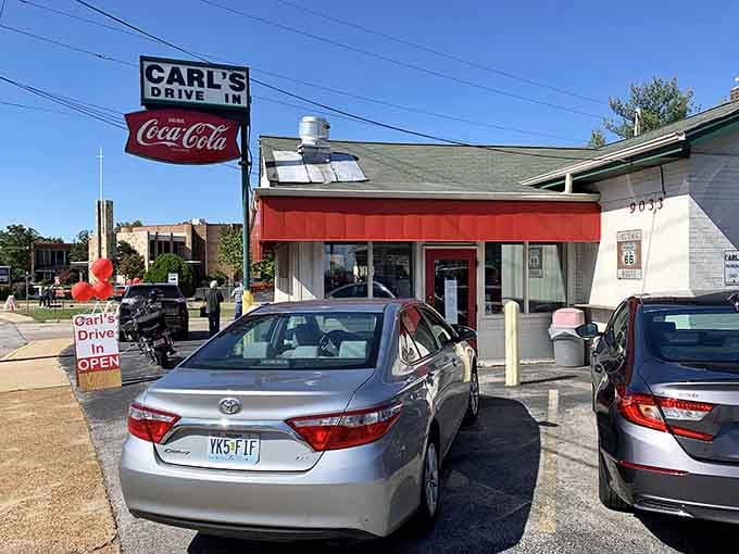 Cars lined up at Carl's like it's 1959 and everyone just discovered the magic of curbside service and perfectly grilled burgers.