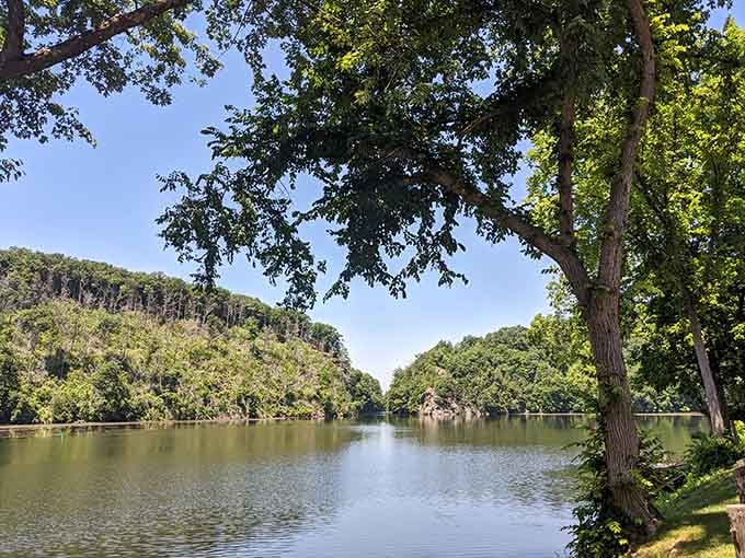The Housatonic River reflects the sky like nature's own mirror, proving Connecticut knows how to show off.