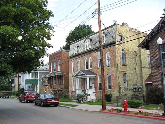 Residential streets where homes have actual personality and porches, not just price tags that require a financial advisor to understand.