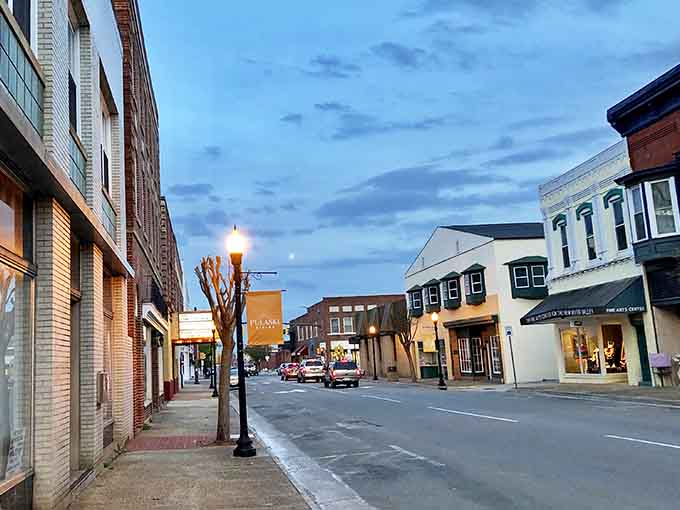 Downtown Pulaski at dusk showcases the charming Main Street where affordable living meets small-town character and welcoming local businesses.