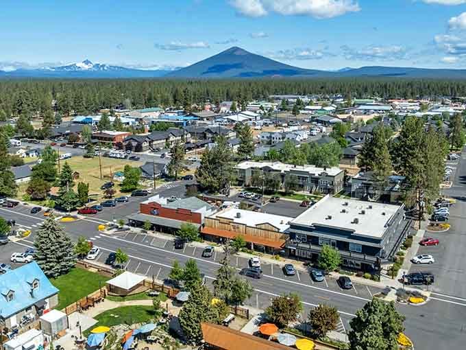 Those mountain peaks aren't just scenery, they're the three sisters who gave this town its name and its soul.