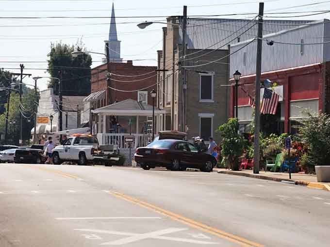 Small-town Kentucky at its finest, where church steeples peek over brick buildings and neighbors still wave from their porches.