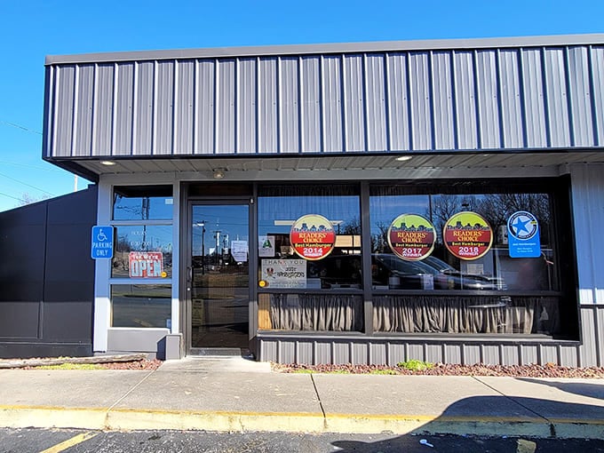 The metal exterior might not scream "gourmet destination," but burger aficionados know that true culinary treasures often hide in the most unassuming packages.