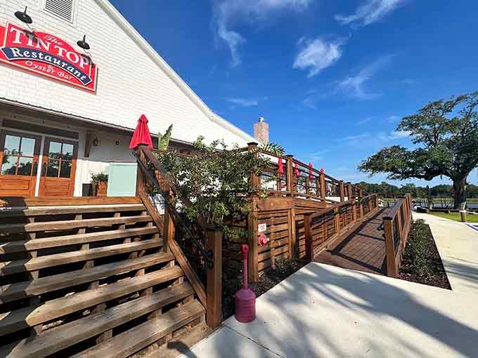That wooden deck stretching toward the entrance isn't just a walkway—it's your bridge to seafood paradise.
