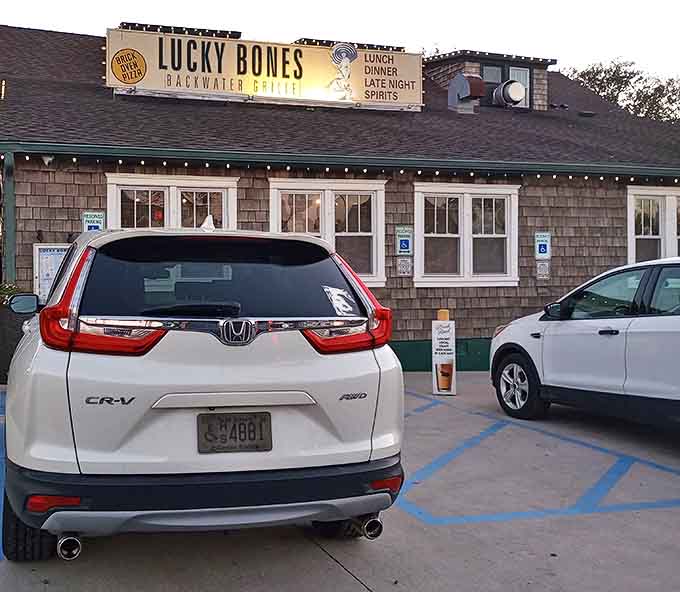The weathered shingle siding and green trim of Lucky Bones whispers "come on in" like an old friend who knows all the best fishing spots in Cape May.