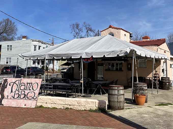 That pink stucco and white tent combo shouldn't work this well, yet here we are, completely charmed.