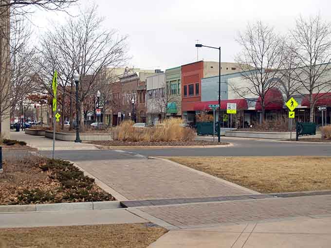 Winter reveals the bones of downtown Greeley, where colorful storefronts wait patiently for spring shoppers like actors ready for their cue.