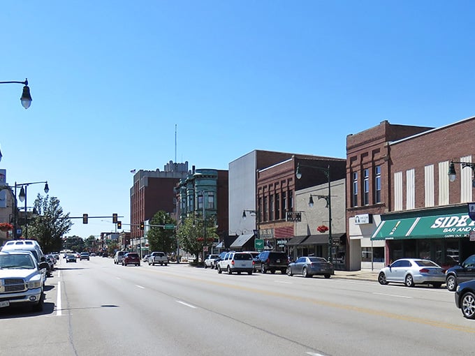 Sunlight bathes Galesburg's historic commercial district, highlighting the distinctive copper-patinated bay windows and architectural details that big-city developers would charge a fortune to replicate.