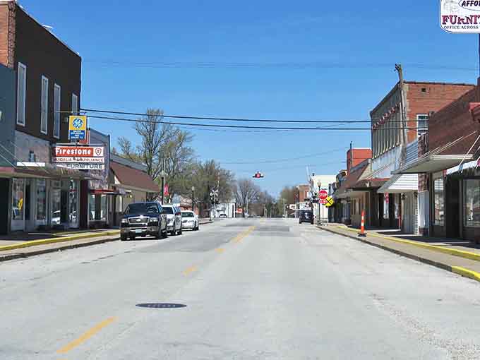 Classic small-town storefronts where the architecture tells stories and the awnings provide actual shade instead of ironic ambiance.