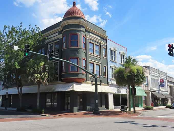 That distinctive copper-domed corner building anchors Russell Street with Victorian charm, a landmark that's witnessed generations of Orangeburg life unfold beneath it.