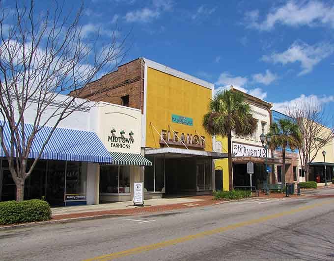 Midtown Fashions and neighboring storefronts offer small-town shopping without big-city prices, where brick sidewalks invite leisurely window browsing rather than hurried commerce.