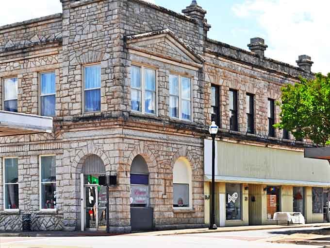 Historic stone building stands proudly on Martinsville's corner, showcasing the town's architectural heritage with elegant details and character.