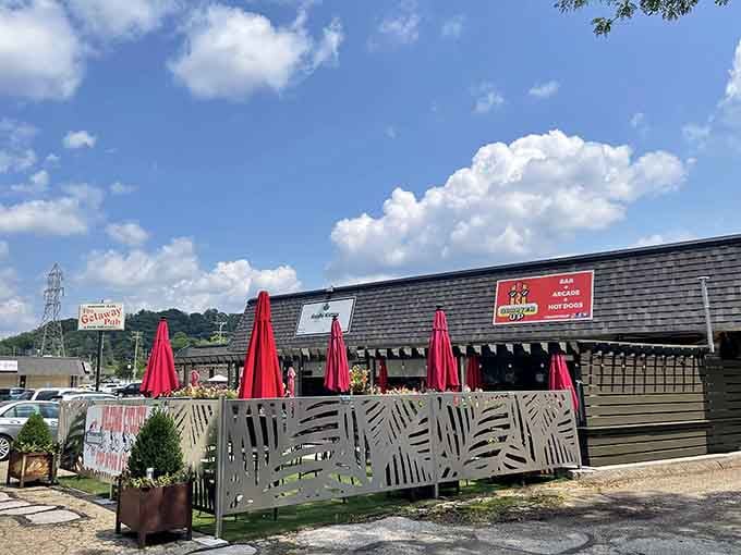 Red umbrellas and outdoor seating prove that even retro gamers need fresh air between their Pac-Man marathons.