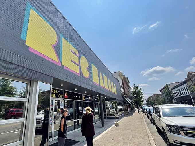 Recbar 812's vibrant storefront stands out on Pearl Street, promising nostalgic fun and modern entertainment under one retro-styled roof.
