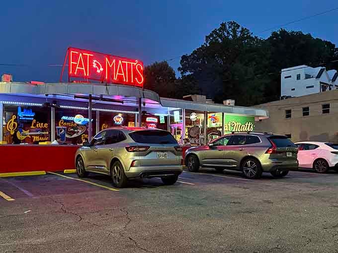 That neon glow isn't just a sign, it's a beacon calling you home to ribs and blues that'll change your life.