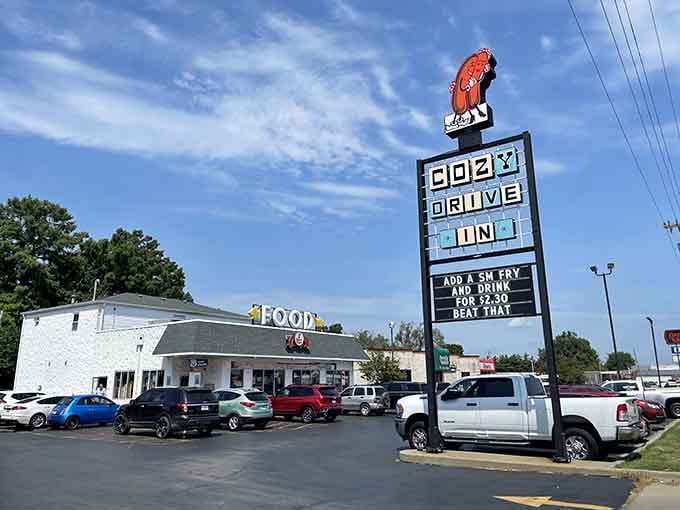 That towering sign with the dancing corn dog isn't just advertising; it's a beacon of hope for hungry travelers everywhere.