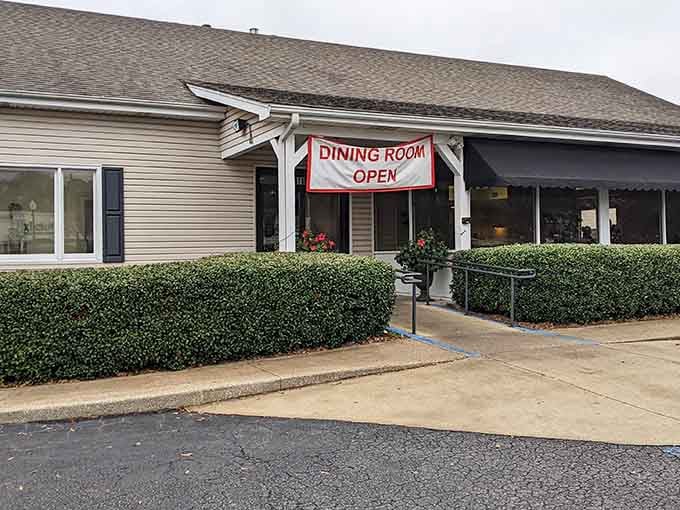 Like a Southern grandmother's welcome, the entrance with its straightforward "DINING ROOM OPEN" banner cuts right to the chase. No need for fancy marketing when the food creates its own buzz.