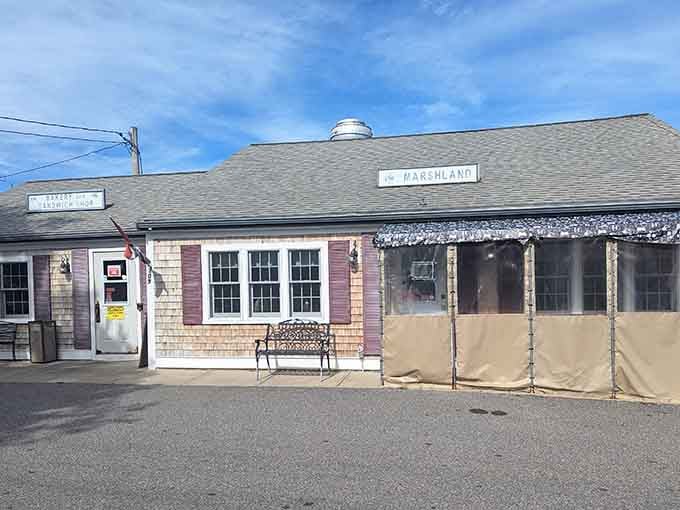 That classic Cape Cod exterior isn't trying to impress anyone, which is exactly why it impresses everyone who walks through the door.