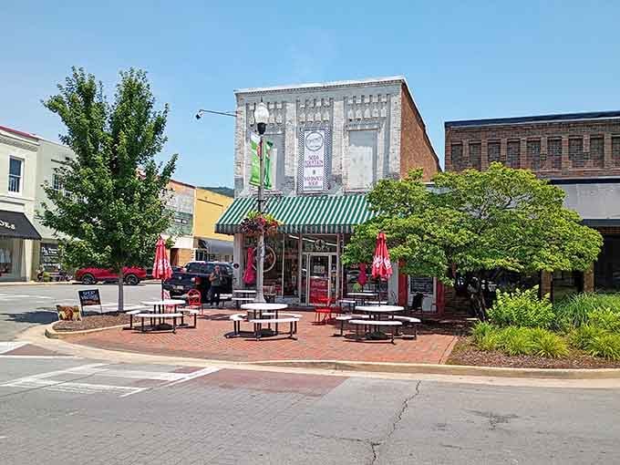 Brick walls adorned with memories remind you that restaurants become landmarks by serving communities, not just customers.