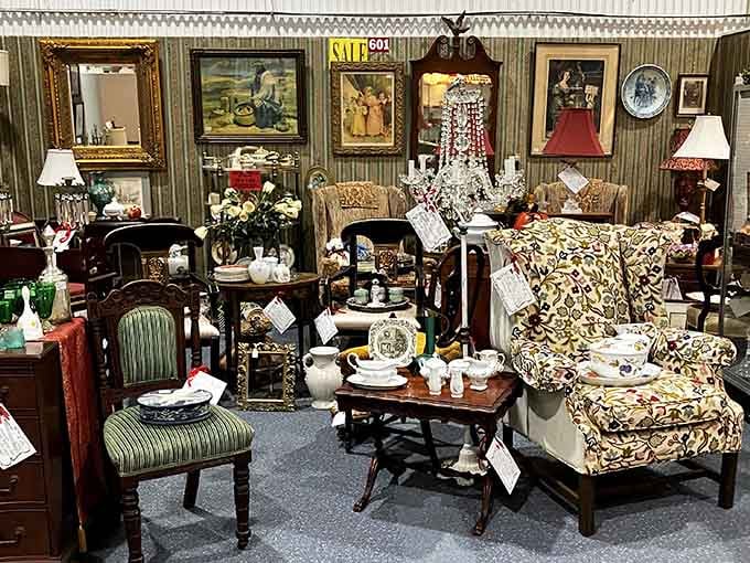 Living room or museum? This elegantly staged booth transforms ordinary furniture shopping into a treasure hunt through America's decorative past.
