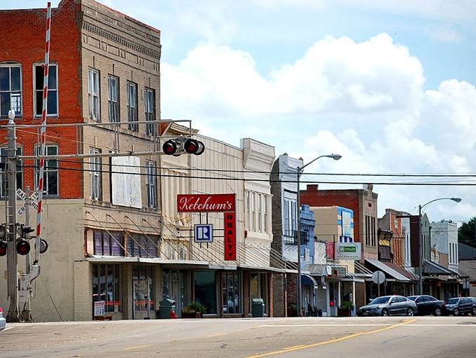 Downtown Navasota's historic buildings stand like well-preserved time travelers, their wrought-iron balconies whispering stories of Texas past while welcoming modern visitors.