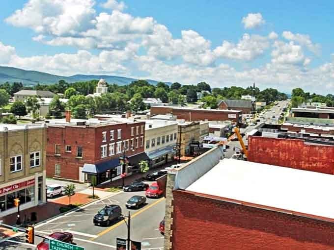 Wytheville's charming downtown stretches toward rolling Blue Ridge mountains, showcasing its perfect blend of small-town and nature.