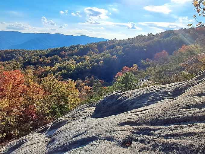 Standing on ancient rock while autumn shows off below, this is what "room at the top" really means.