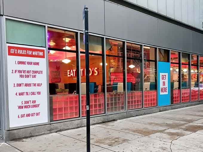 Those neon-lit windows practically beg you to come inside for burgers and wisecracks galore.