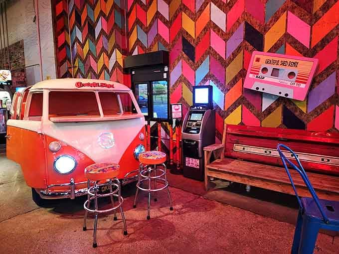Behind that psychedelic chevron wall sits your groovy chariot, complete with colorful stools for the overflow crowd.