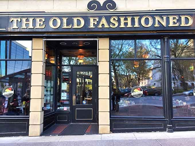 The iconic black and gold signage of The Old Fashioned has welcomed generations of cheese curd enthusiasts, politicians, and anyone seeking a proper Wisconsin Old Fashioned.