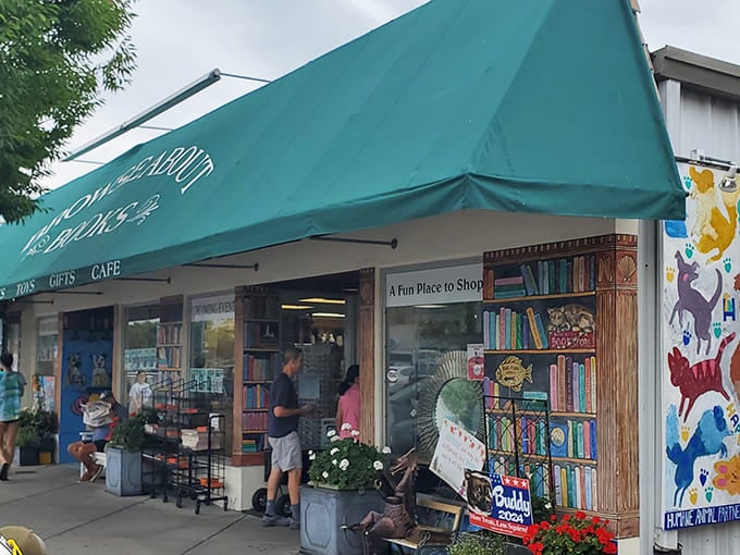 The iconic green awning of Browseabout Books beckons bibliophiles like a literary lighthouse on Rehoboth's bustling avenue.